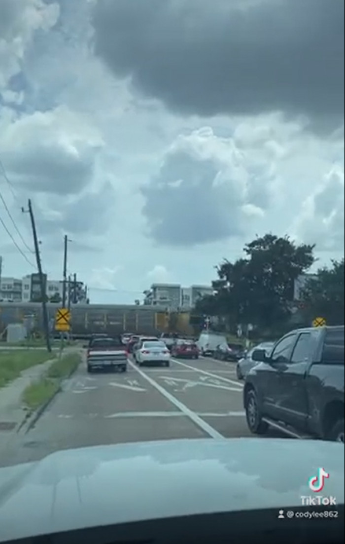 Guy Stuck Behind Train Turns His Head To See The Next Best Thing On The ...